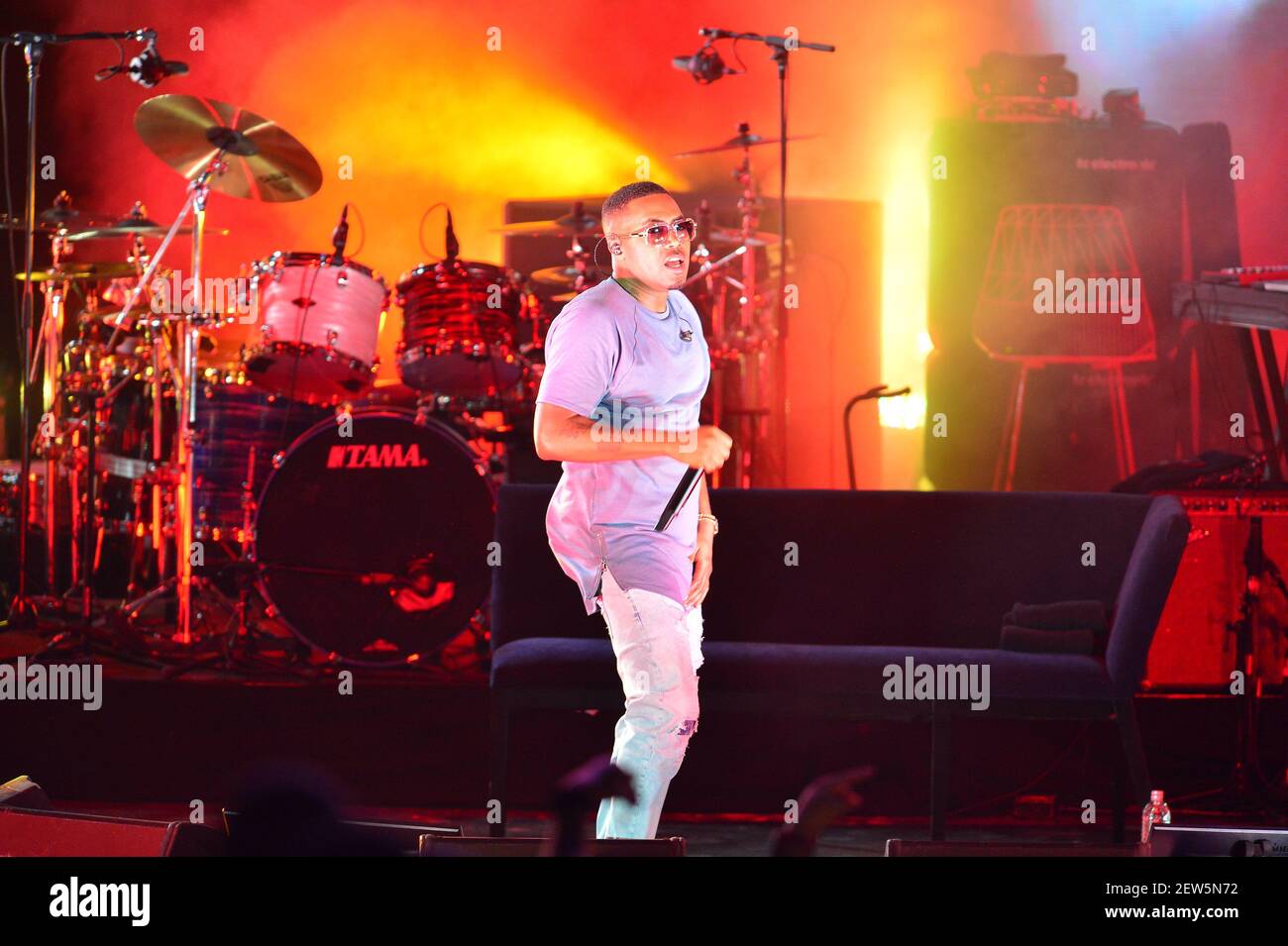 Nas performs on stage during Ms. Lauryn Hill and Nas Powernomics tour ...