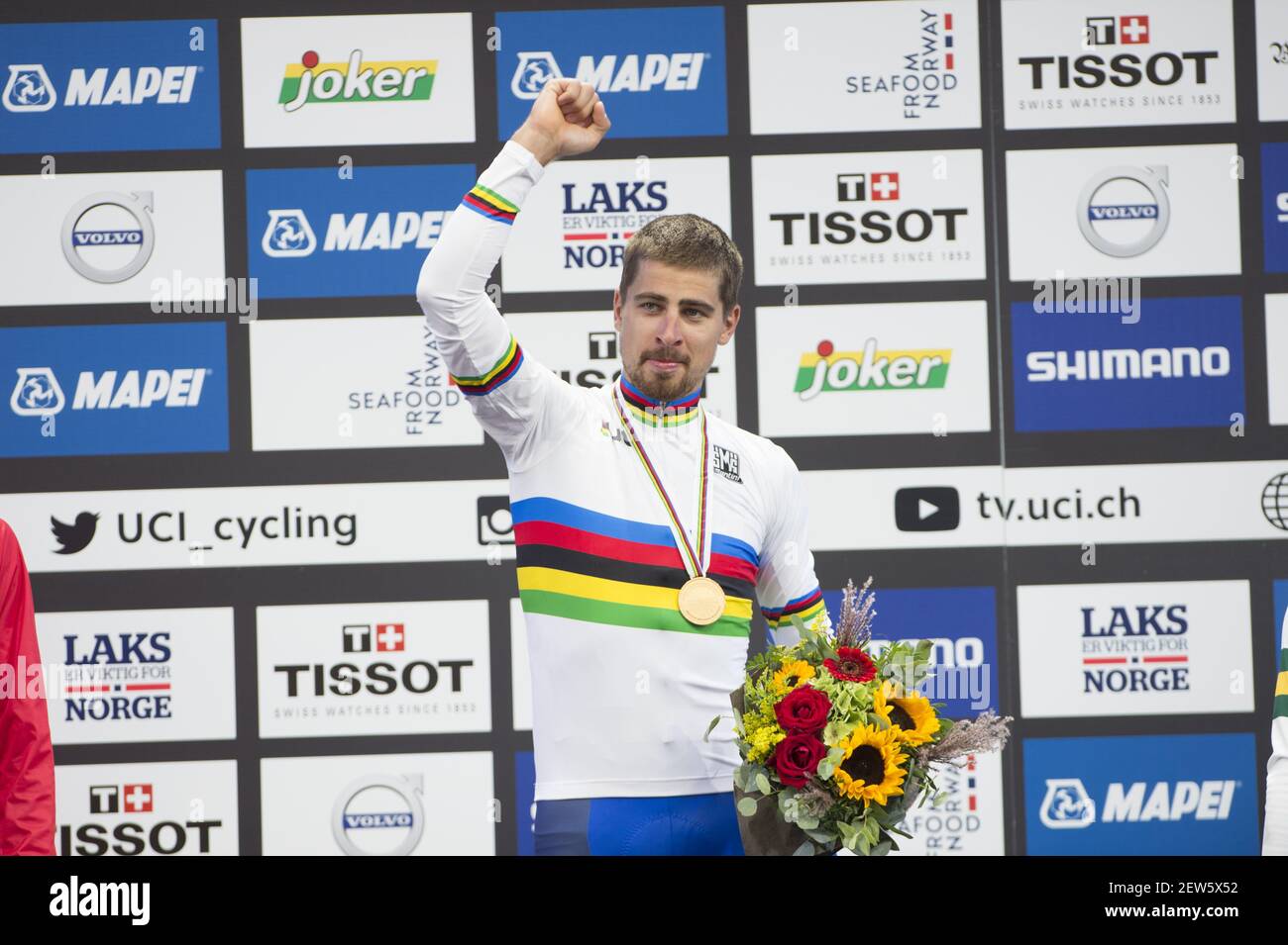 World Champion Peter Sagan of Slovakie celebrates his win on the podium ...