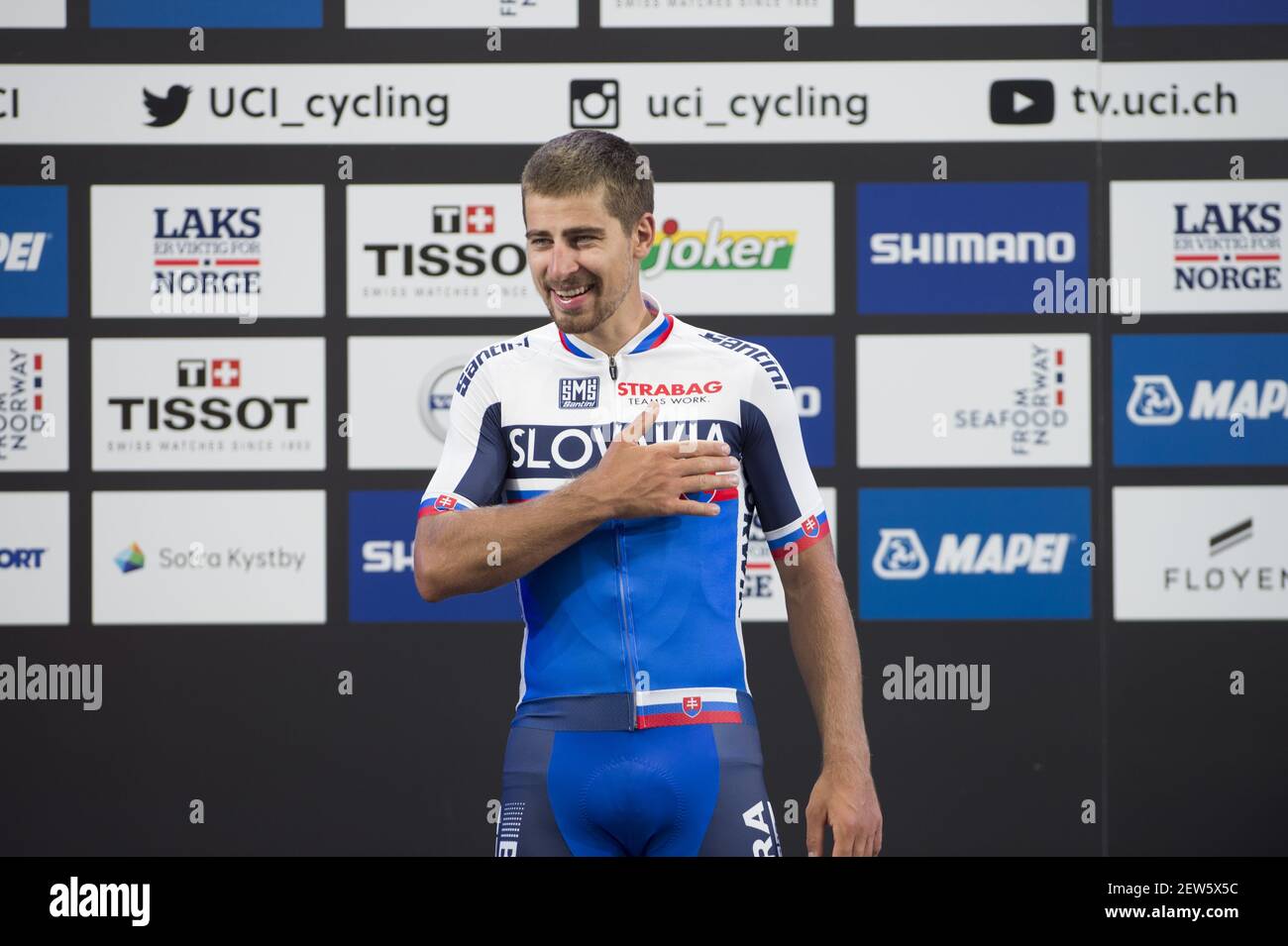 World Champion Peter Sagan of Slovakie celebrates his win on the podium ...