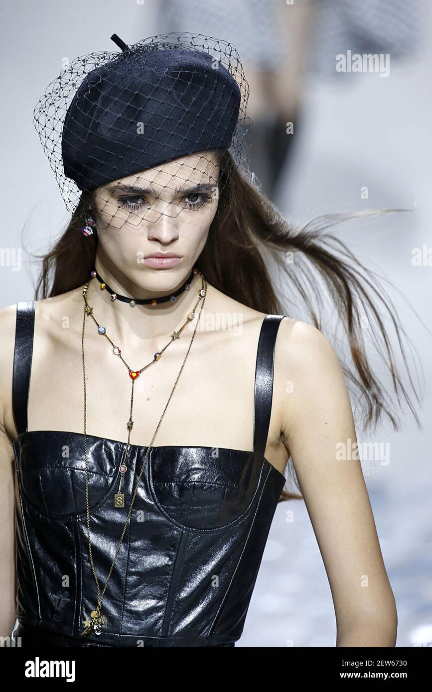 Model Alexandra Micu walks on the runway during the Dior Fashion Show ...