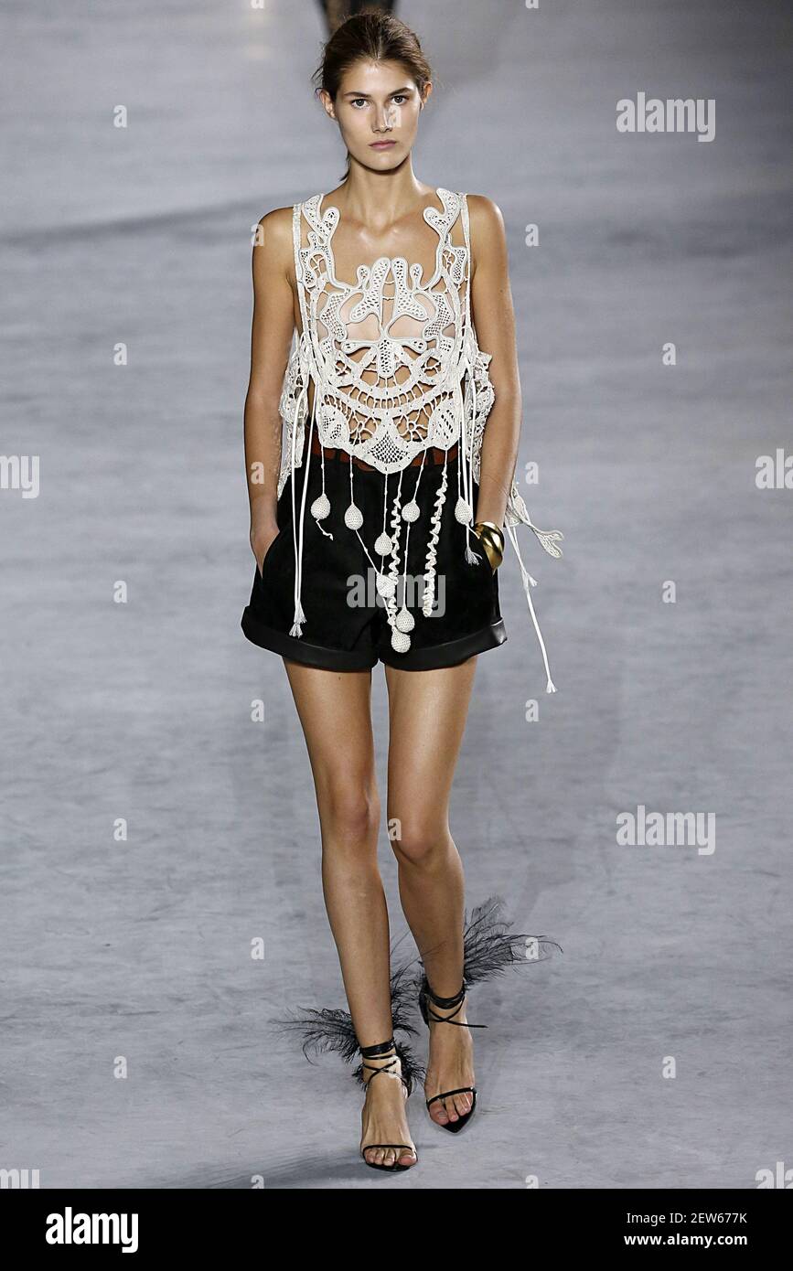 Model Lucia Lopez walks on the runway during the Saint Laurent Fashion ...