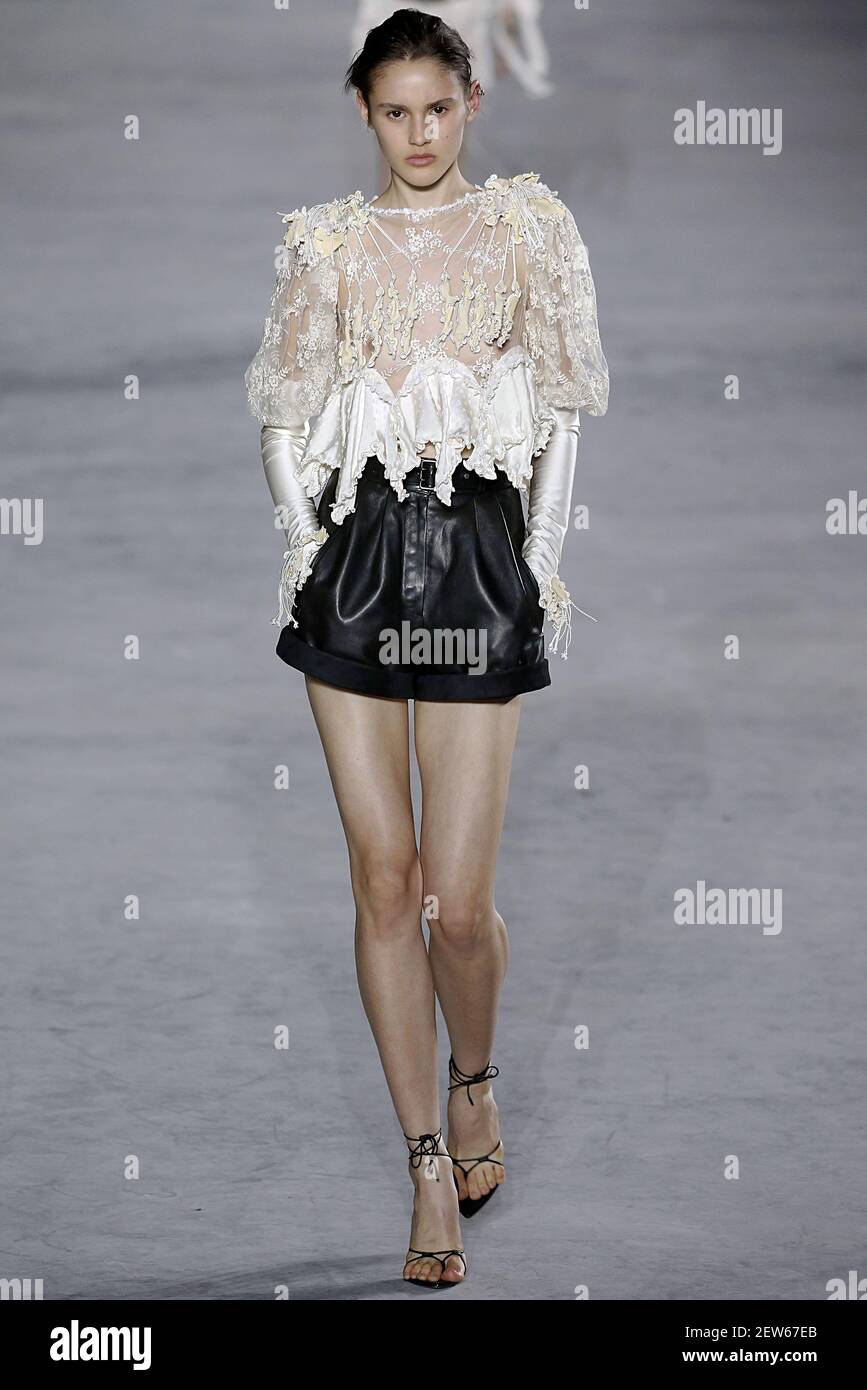 Model Aleyna Fitzgerald walks on the runway during the Saint Laurent ...