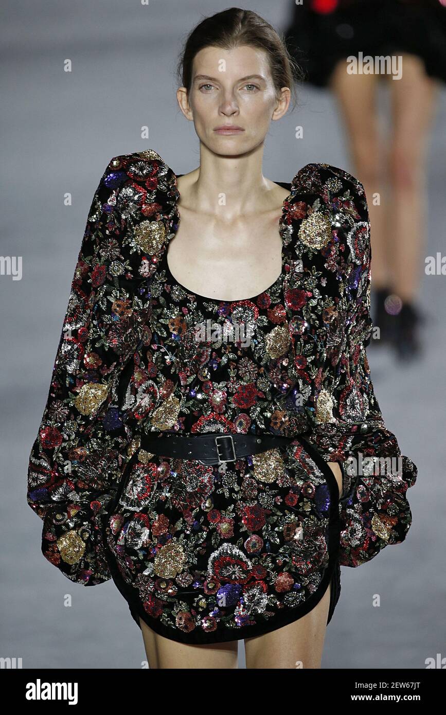 Model Luca Gajdus walks on the runway during the Saint Laurent Fashion ...