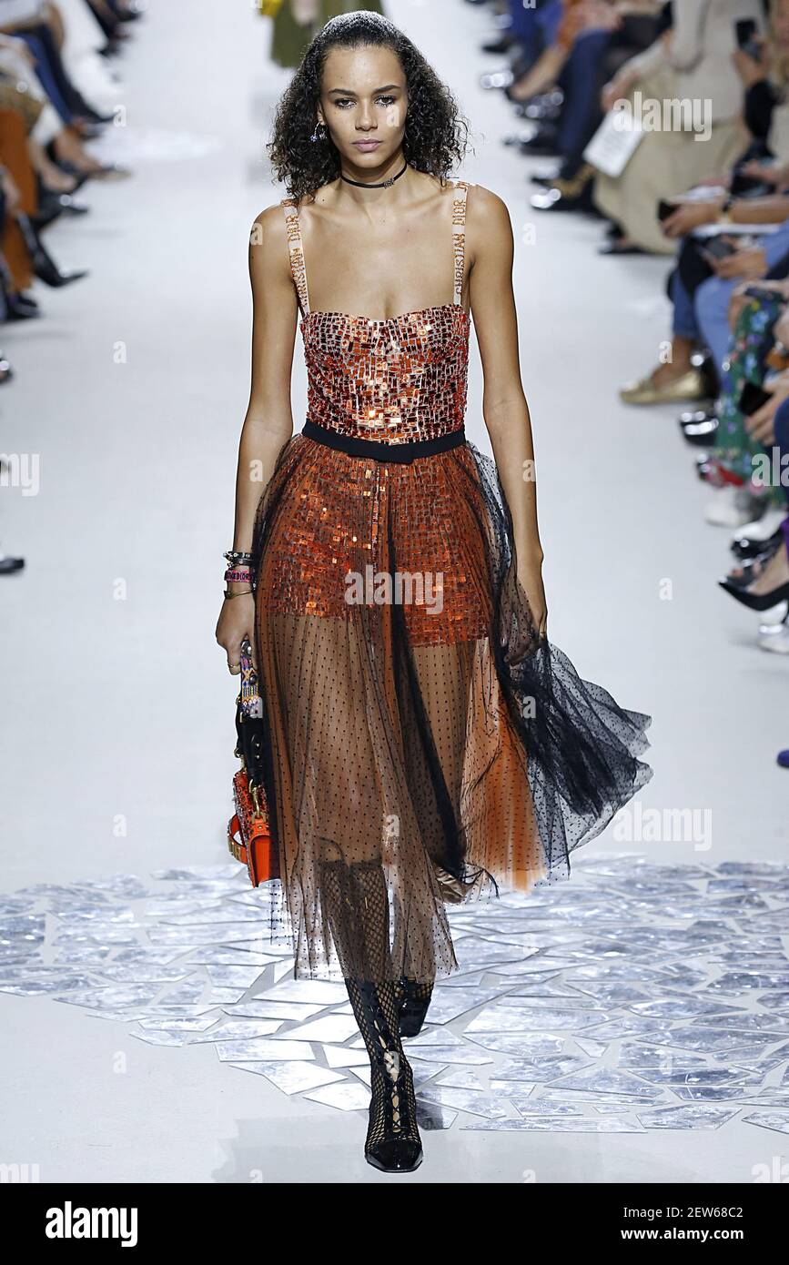 Model Binx Walton walks on the runway during the Dior Fashion Show ...