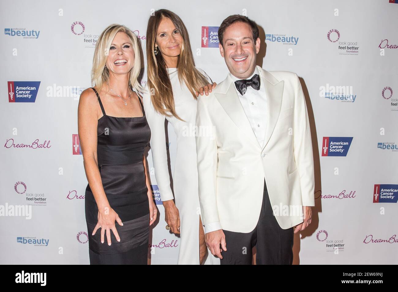(L-R) Marla Beck, Model Elle Macphearson, and Barry Beck attend the ...