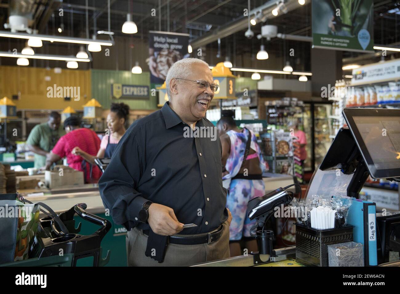 Addison Shields, 68, purchases groceries at the Englewood Whole Foods ...