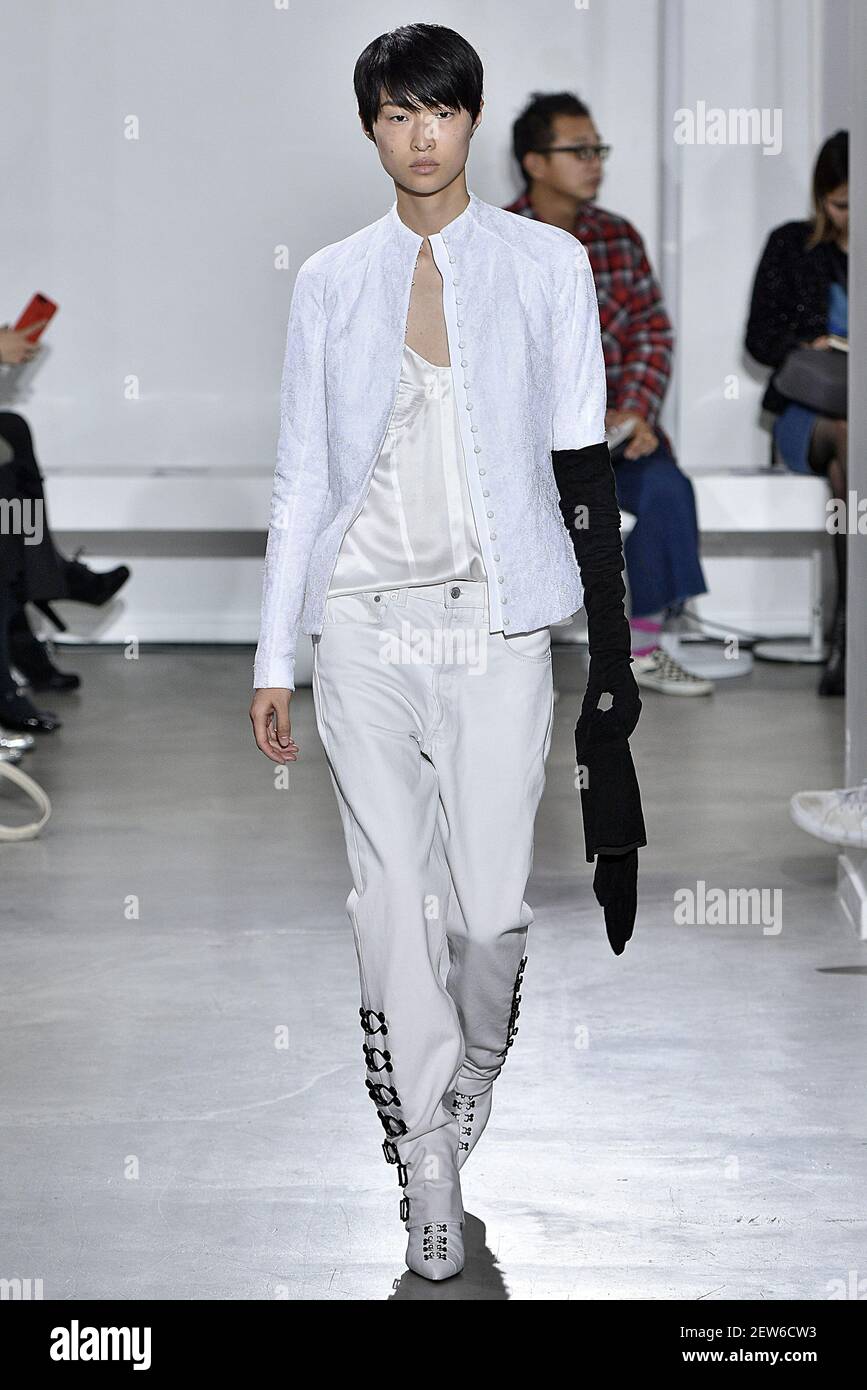 Model Chu Wong walks on the runway during the Olivier Theyskens Fashion ...