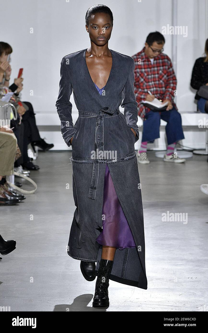 Model Mayowa Nicholas walks on the runway during the Olivier Theyskens ...