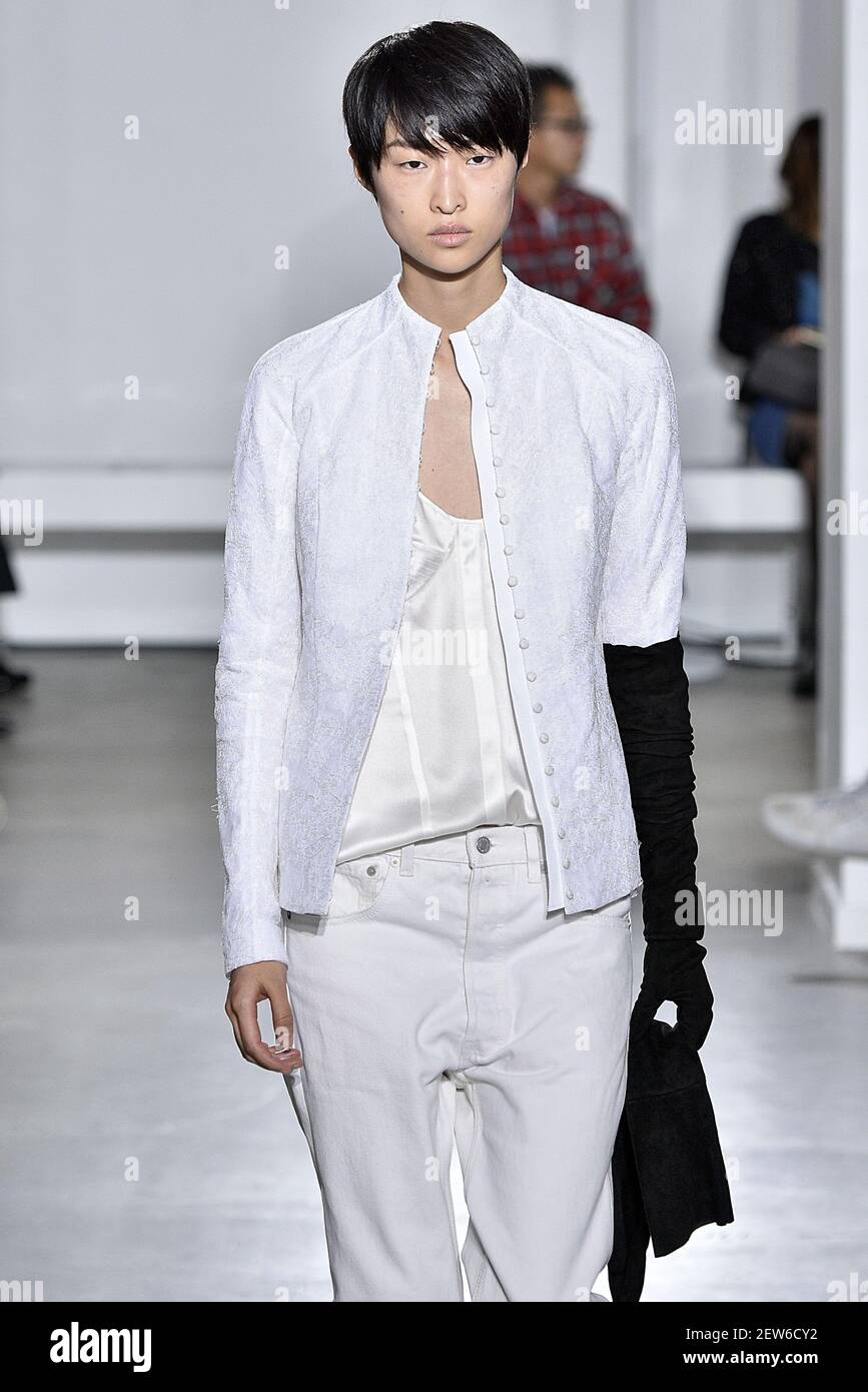 Model Chu Wong walks on the runway during the Olivier Theyskens Fashion ...