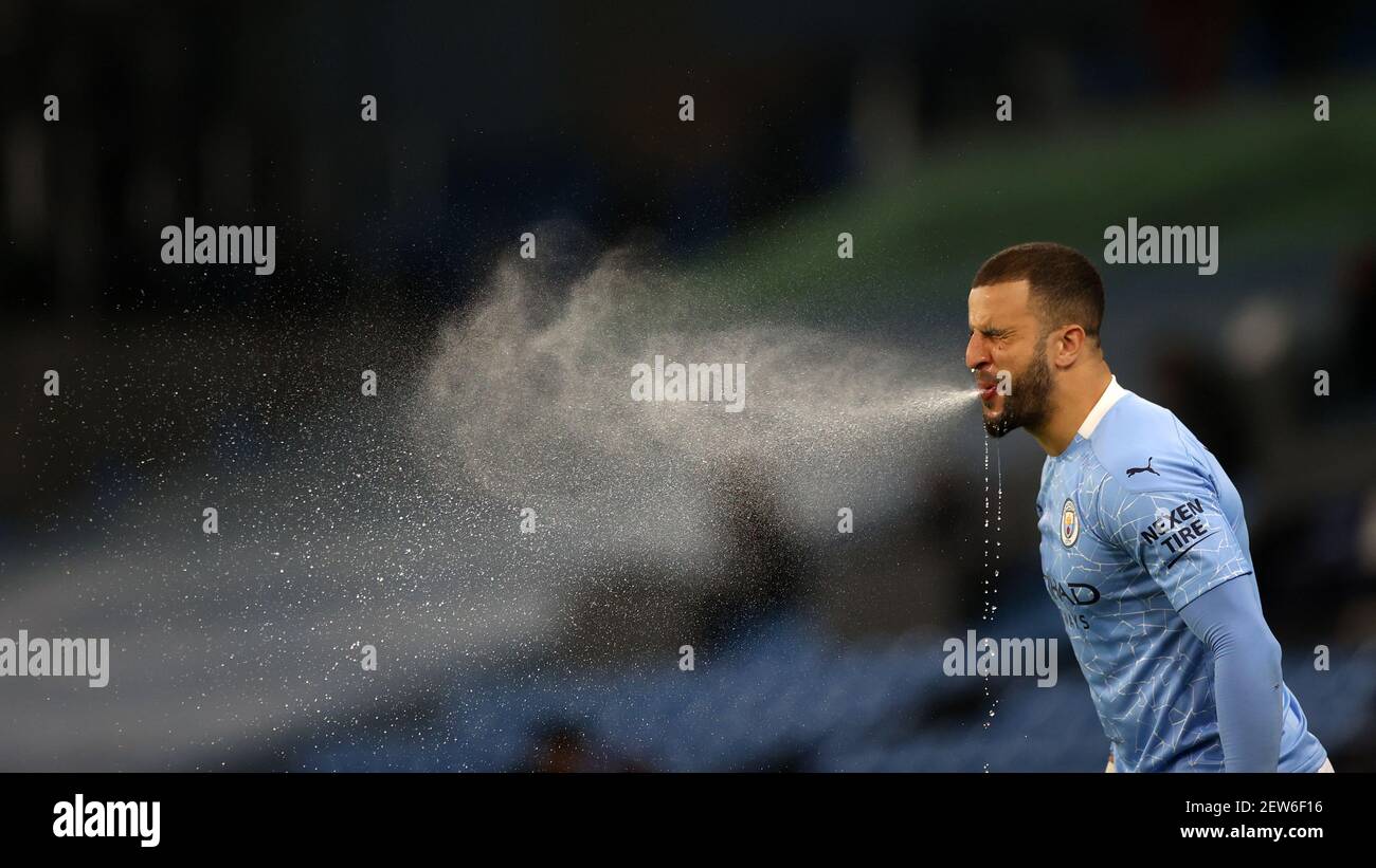 Manchester City's Kyle Walker spits water before the Premier League ...