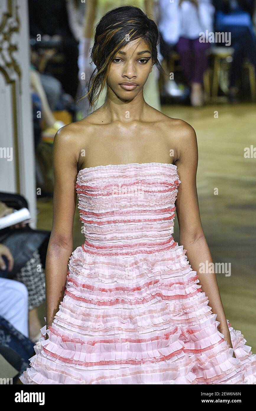 Model Naomi Chin Wing walks on the runway during the John Galliano ...