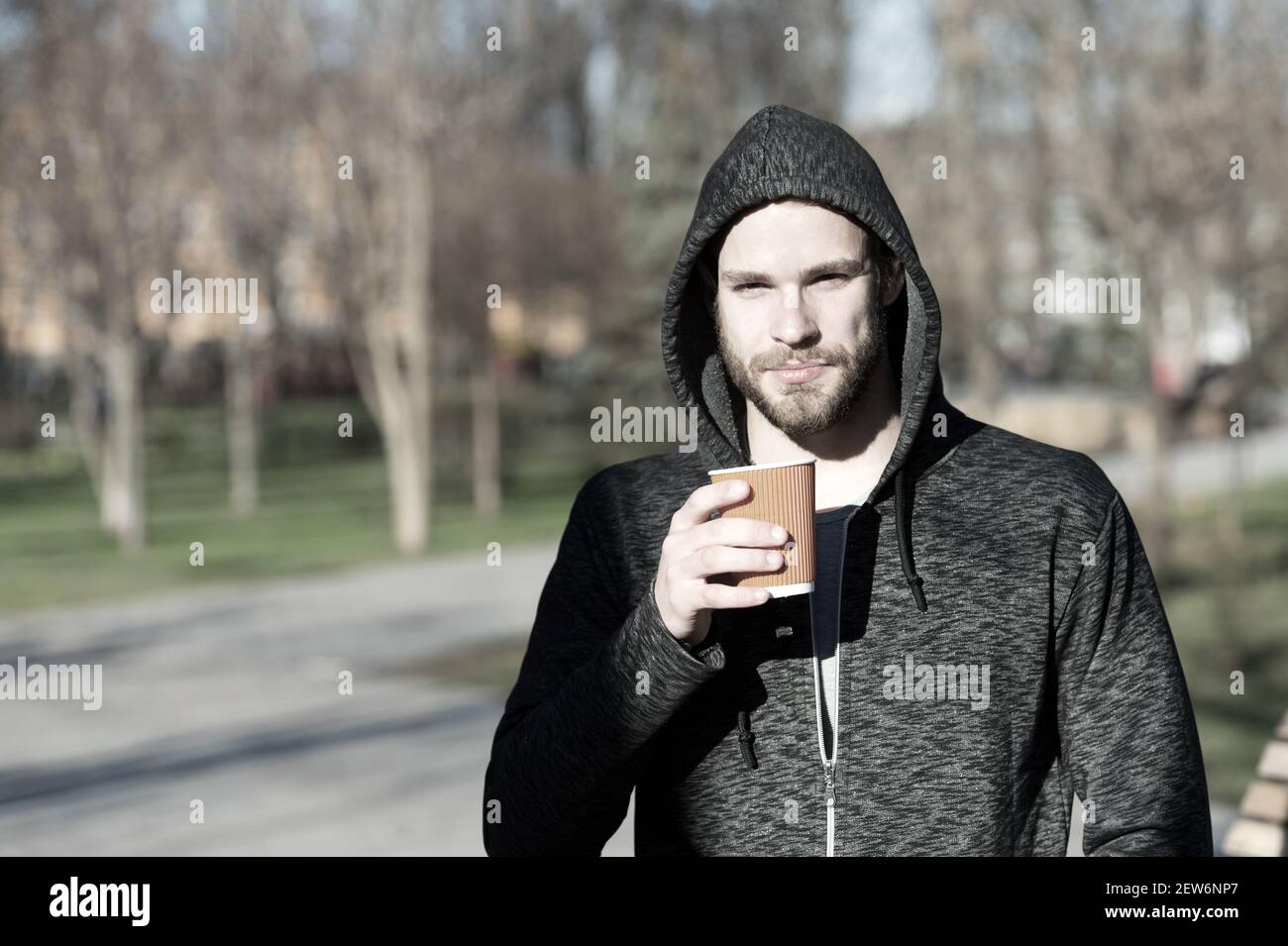 But first coffee. Man morning jog drinks coffee urban background ...