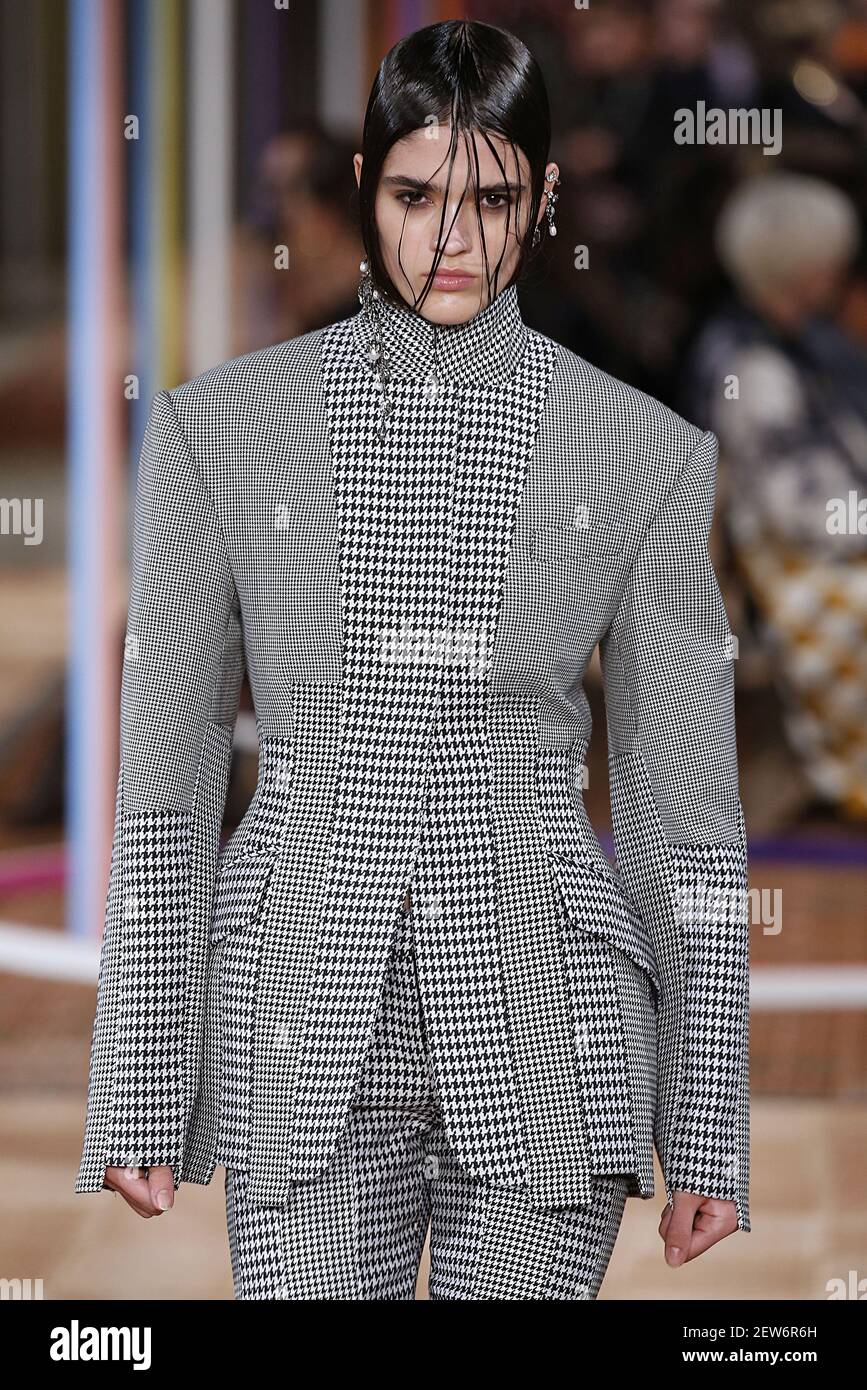 Model Alexandra Micu walks on the runway during the Alexander McQueen ...