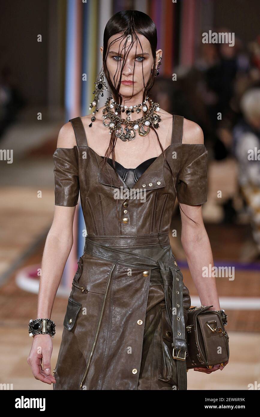 Model Magdalena Chachlica walks on the runway during the Alexander ...