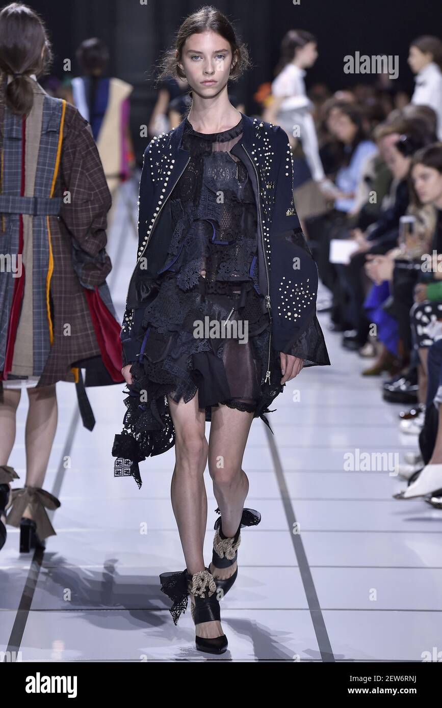 Model Sophie Martynova walks on the runway during the Sacai Fashion ...