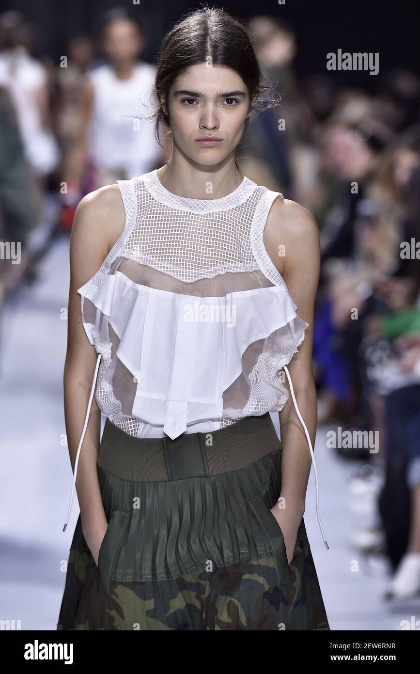 Model Alexandra Micu walks on the runway during the Sacai Fashion Show ...