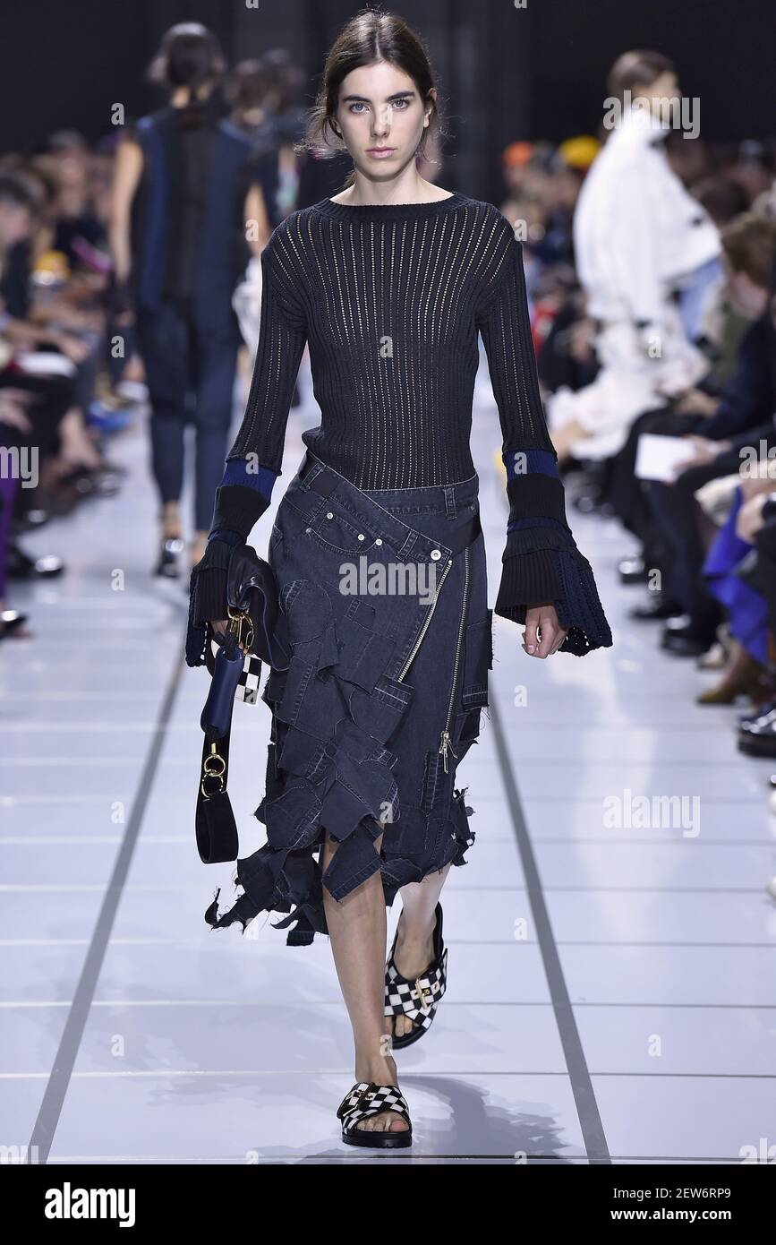 Model Madeleine Knighton walks on the runway during the Sacai Fashion ...
