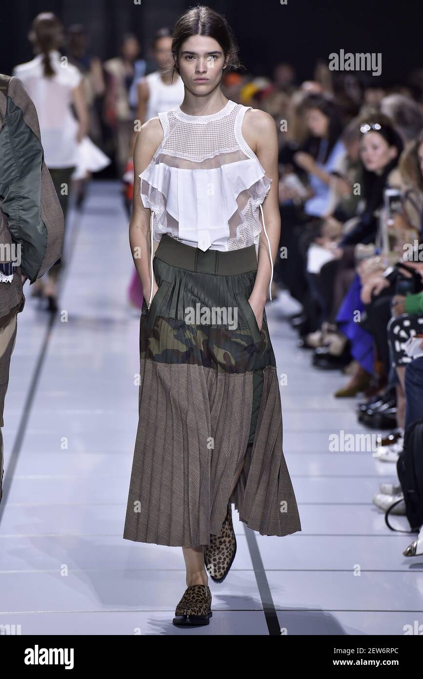 Model Alexandra Micu walks on the runway during the Sacai Fashion Show ...