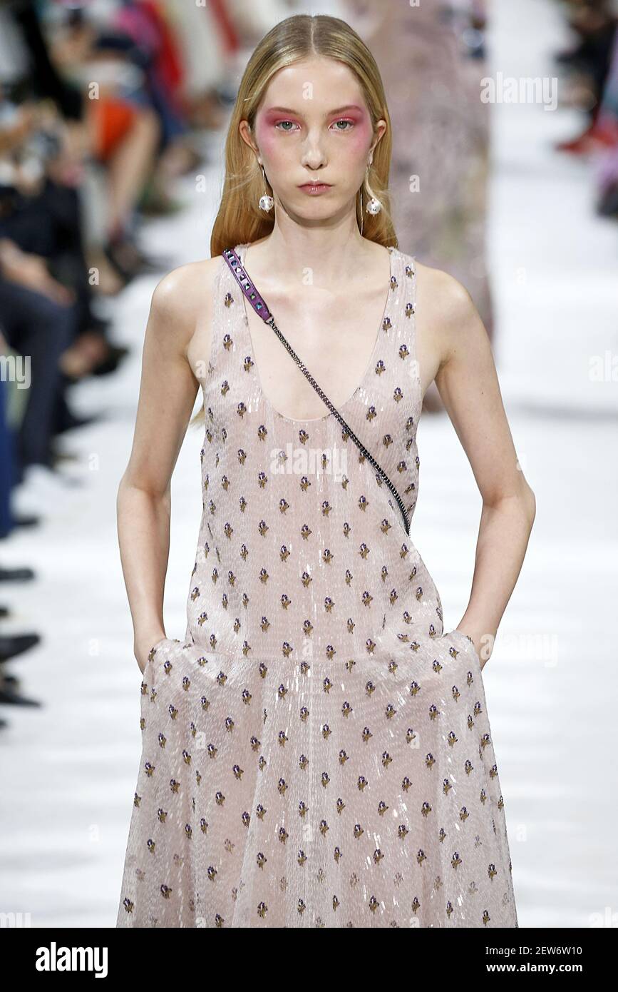 Model Sasha Komarova walks on the runway during the Valentino Fashion ...