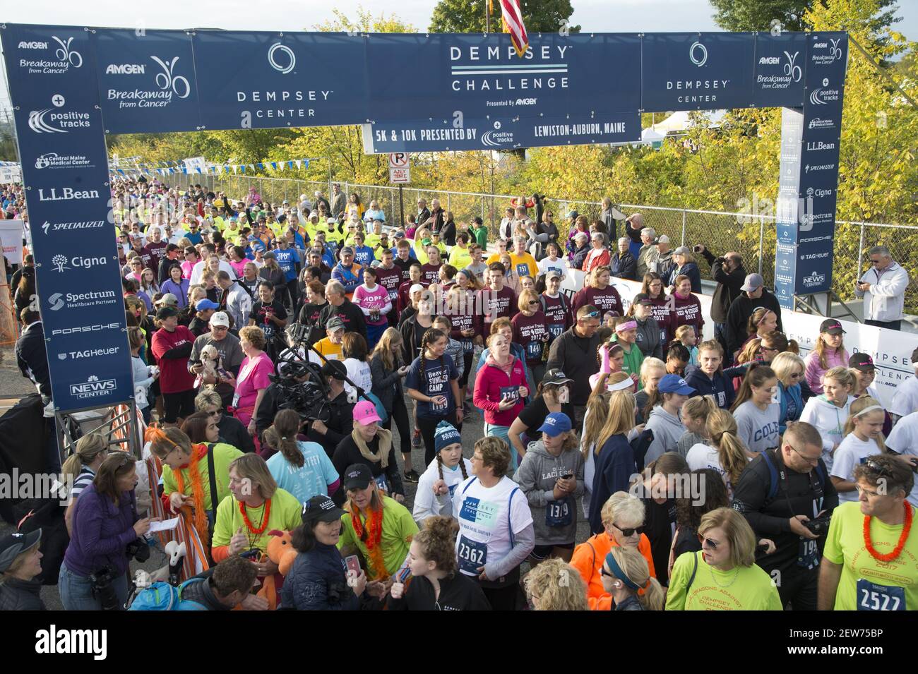 Runners at the start of the 5K run, part of the Dempsey Challenge ...