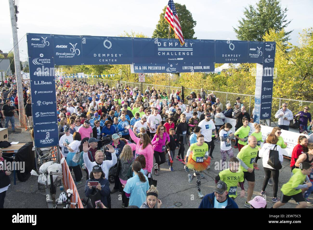 Runners at the start of the 5K run, part of the Dempsey Challenge ...