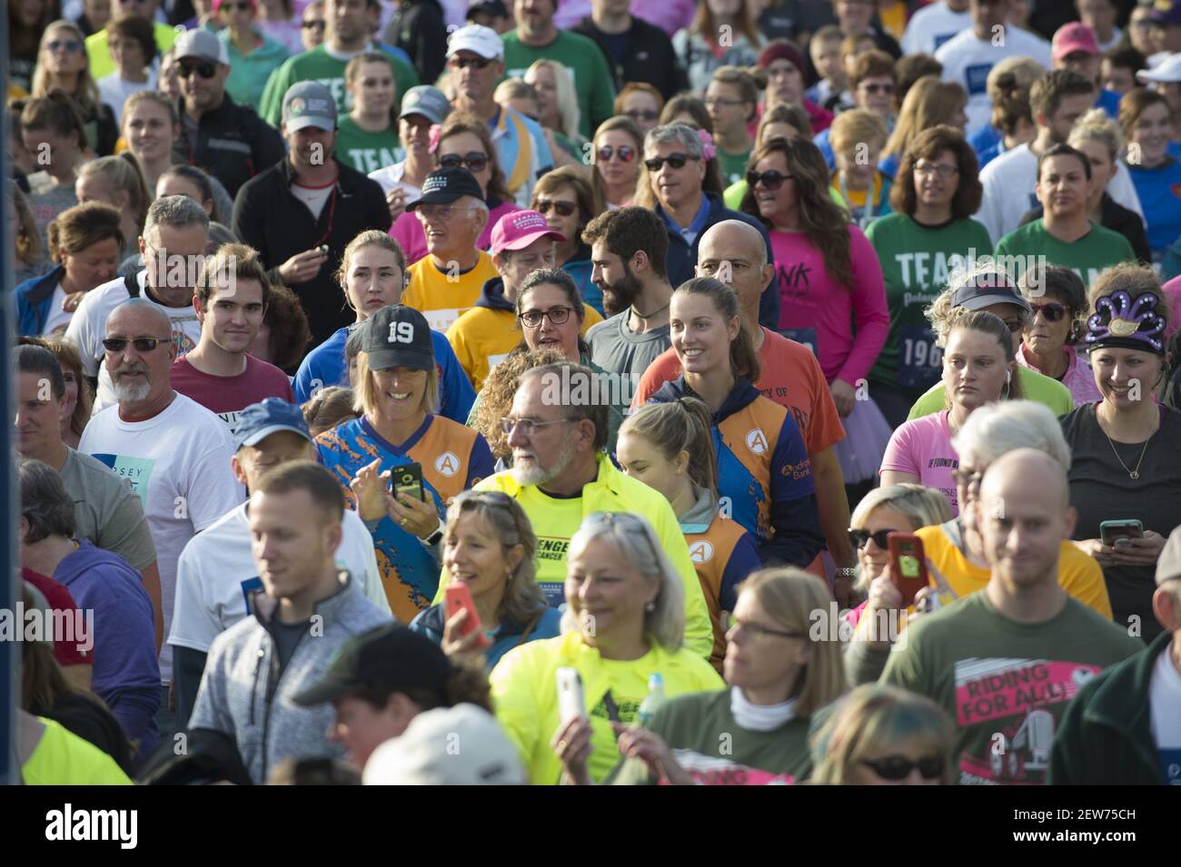 Runners at the start of the 5K run, part of the Dempsey Challenge ...