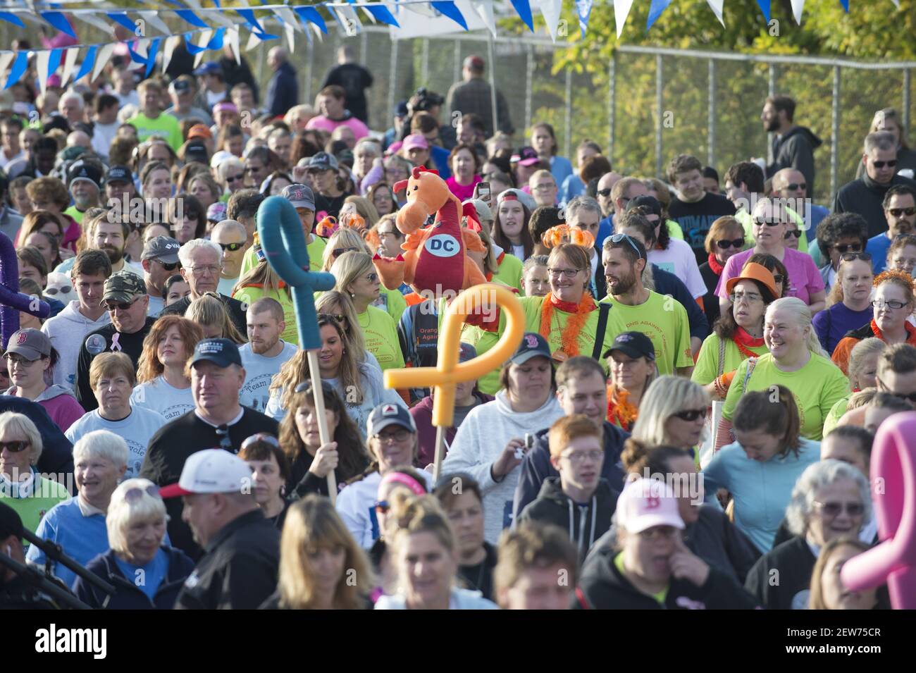 Runners at the start of the 5K run, part of the Dempsey Challenge ...