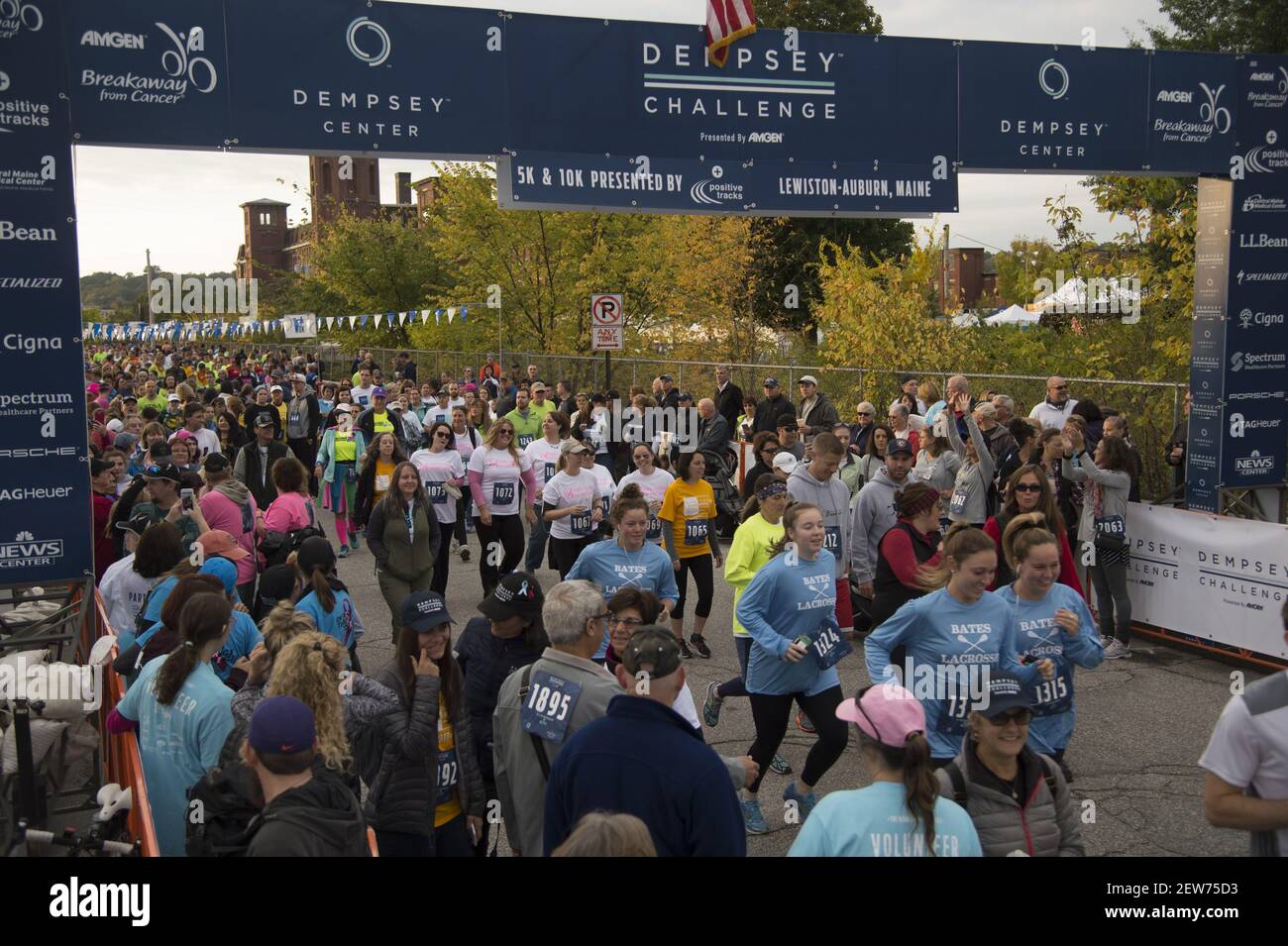 Runners at the start of the 5K run, part of the Dempsey Challenge ...