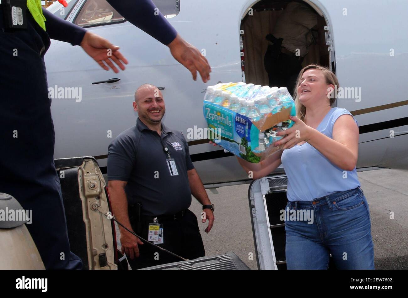 Jessica Brumley, VP Facilities at Nova Southeastern University, helps ...