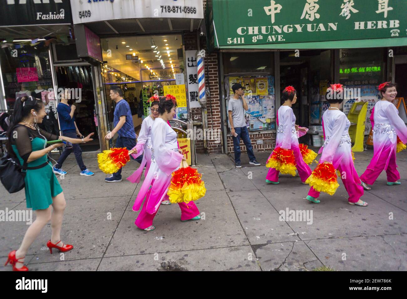 Thousands of people on Eighth Avenue in the Sunset Park neighborhood in Brooklyn in New York on ...