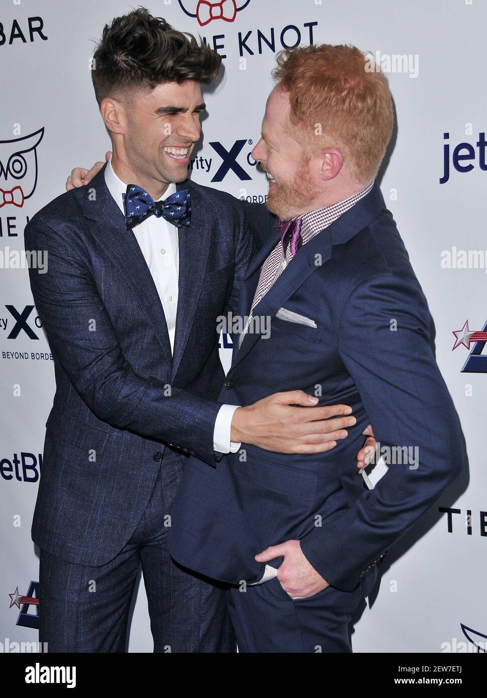 (L-R) Justin Mikita and Jesse Tyler Ferguson arrives at Jessie Tyler ...