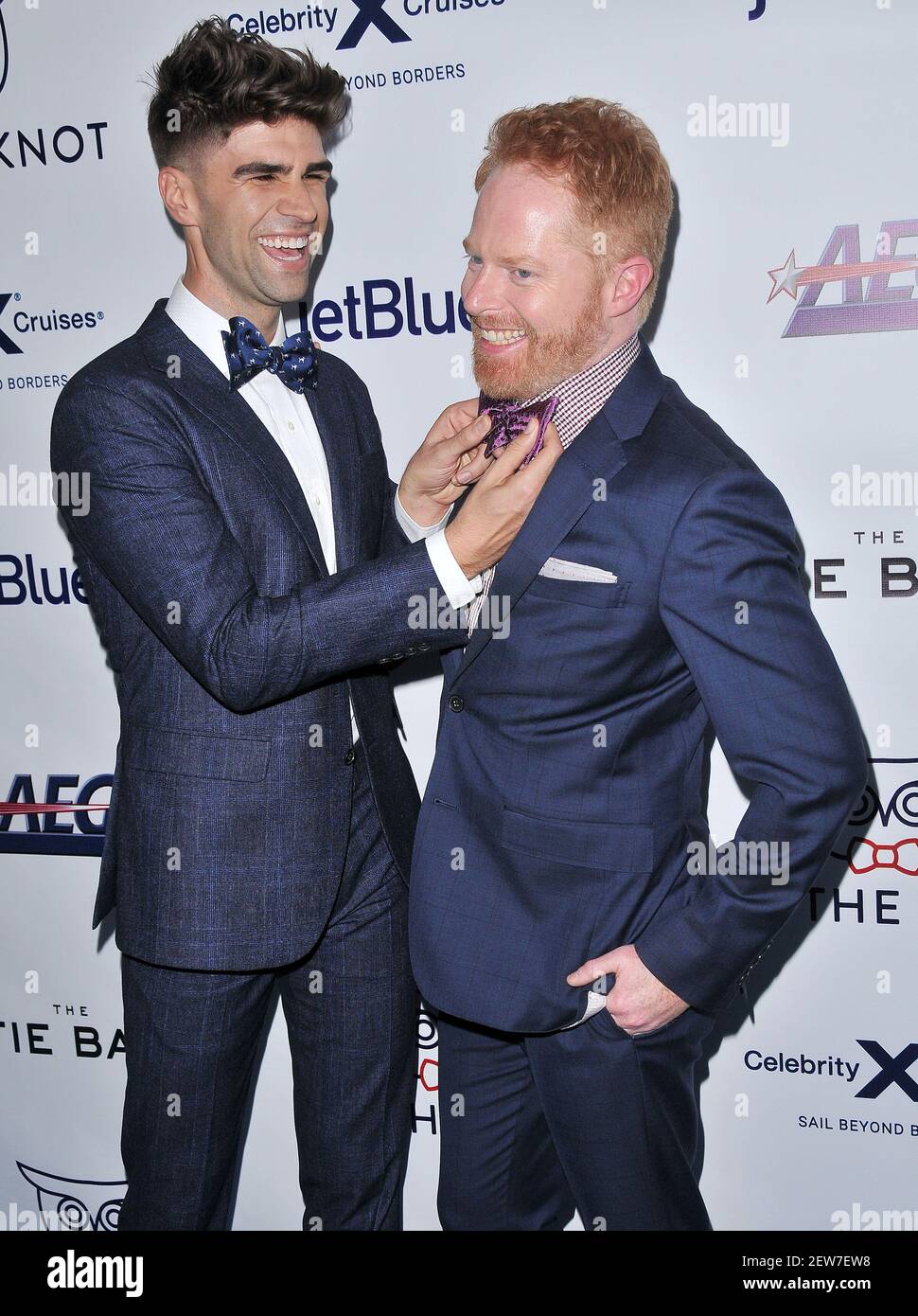 (L-R) Justin Mikita and Jesse Tyler Ferguson arrives at Jessie Tyler ...
