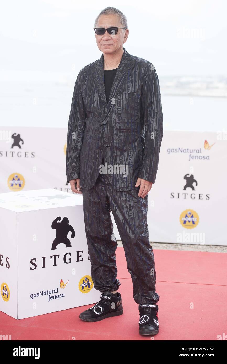 Japanese director Takashi Miike pose to media at Sitges Film Festival ...