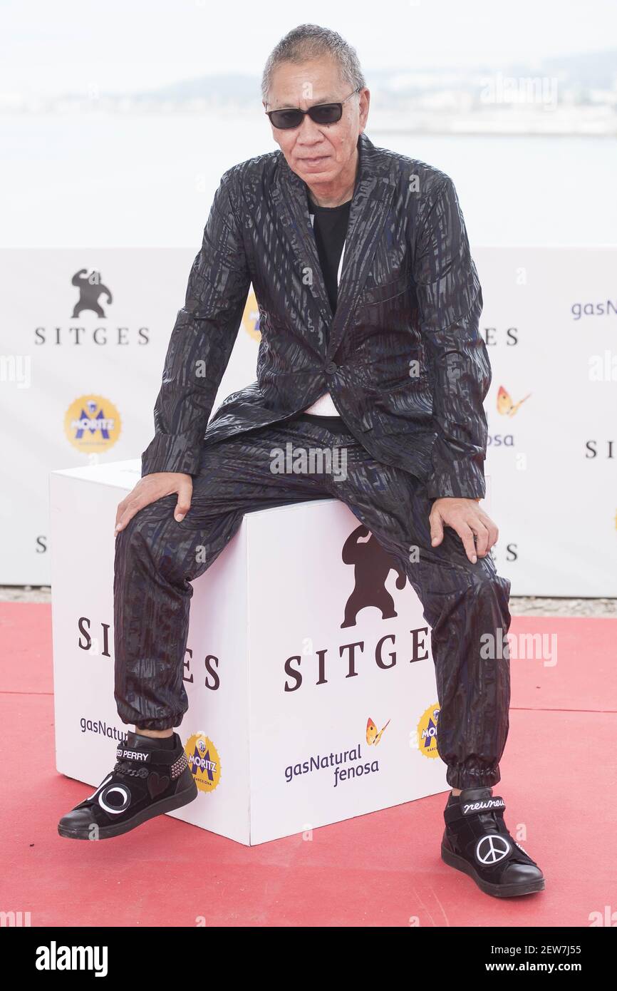 Japanese director Takashi Miike pose to media at Sitges Film Festival ...