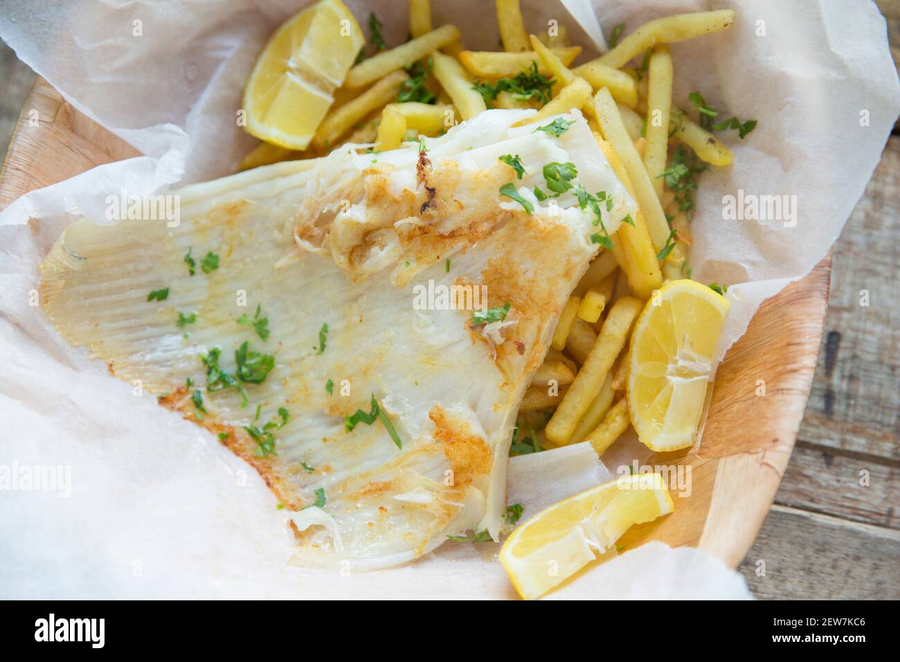 The wing of an Undulate ray, Raja undulata, that has been fried in ...