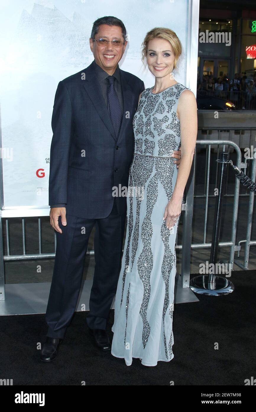 Dean Devlin and Lisa Brenner at the Premiere Of Warner Bros. Pictures ...