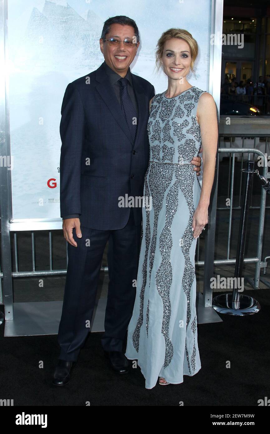 Dean Devlin and Lisa Brenner at the Premiere Of Warner Bros. Pictures ...