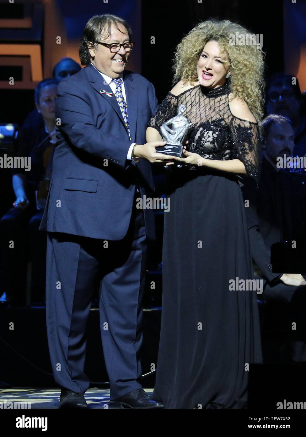 MIAMI, FLORIDA - OCTOBER 19: Alejandro Jaen presents Erika Ender the ...