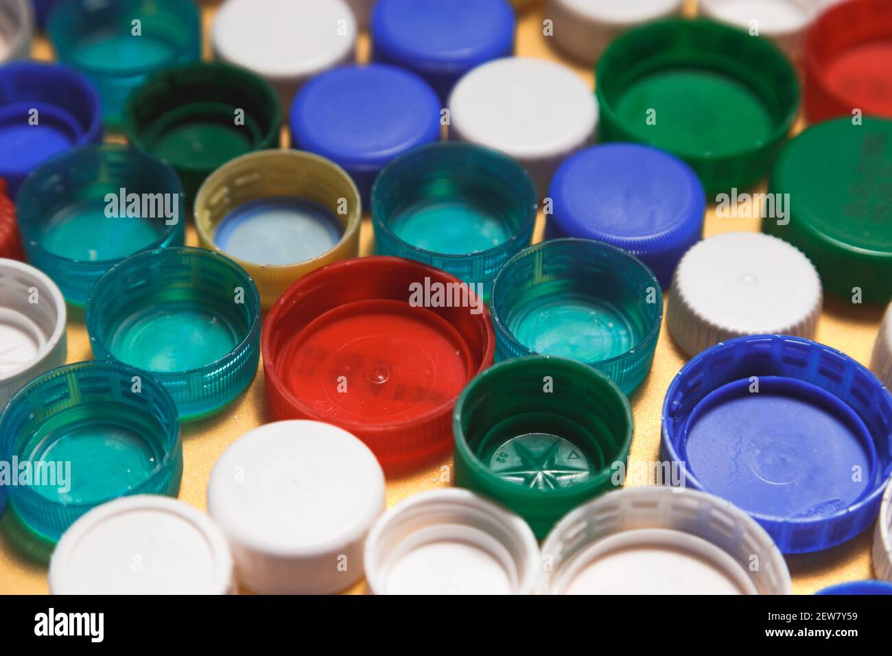 Plastic caps background. Recycling concept Stock Photo - Alamy