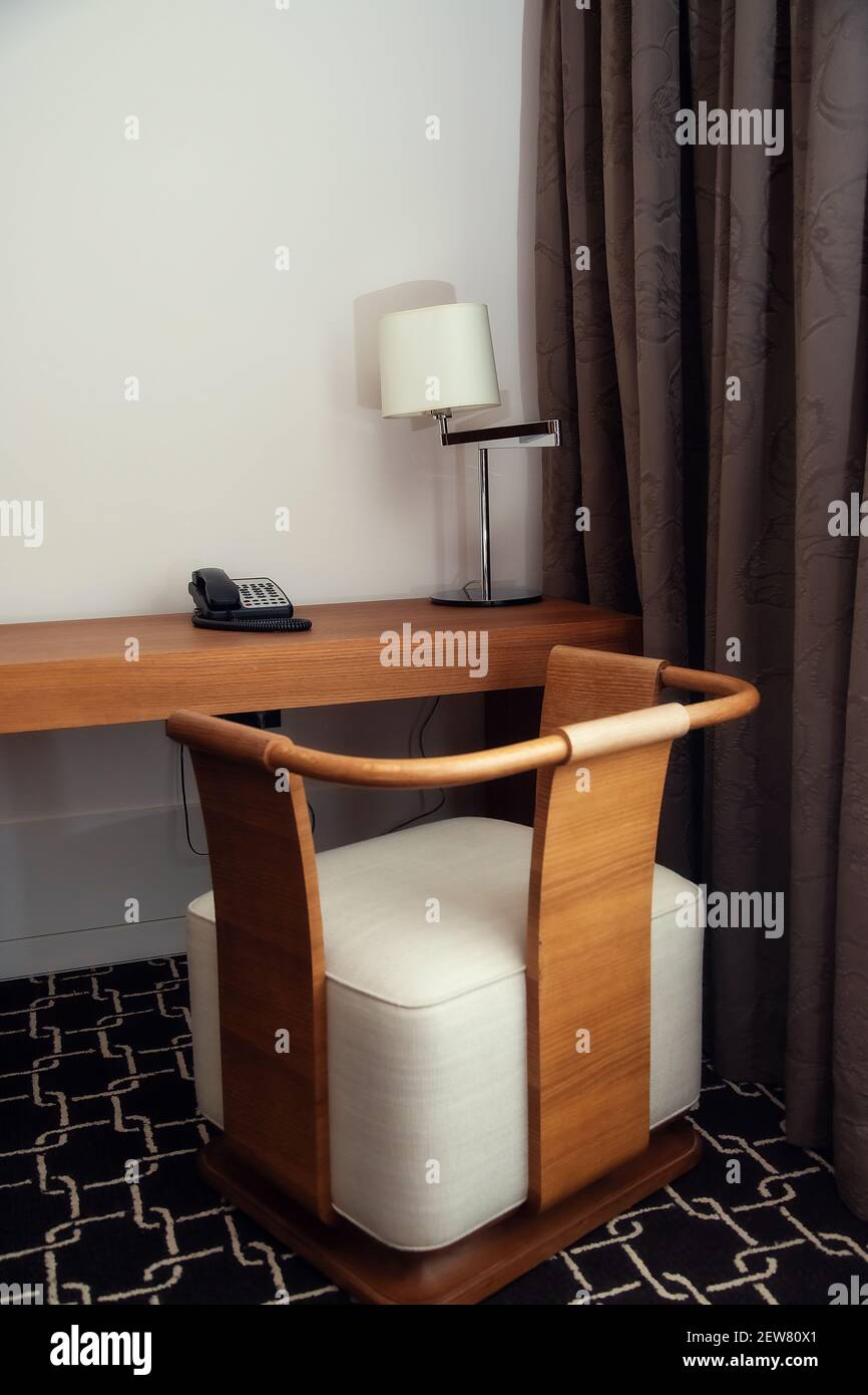 Typical hotel room. Writing desk with table lamp and armchair Stock ...