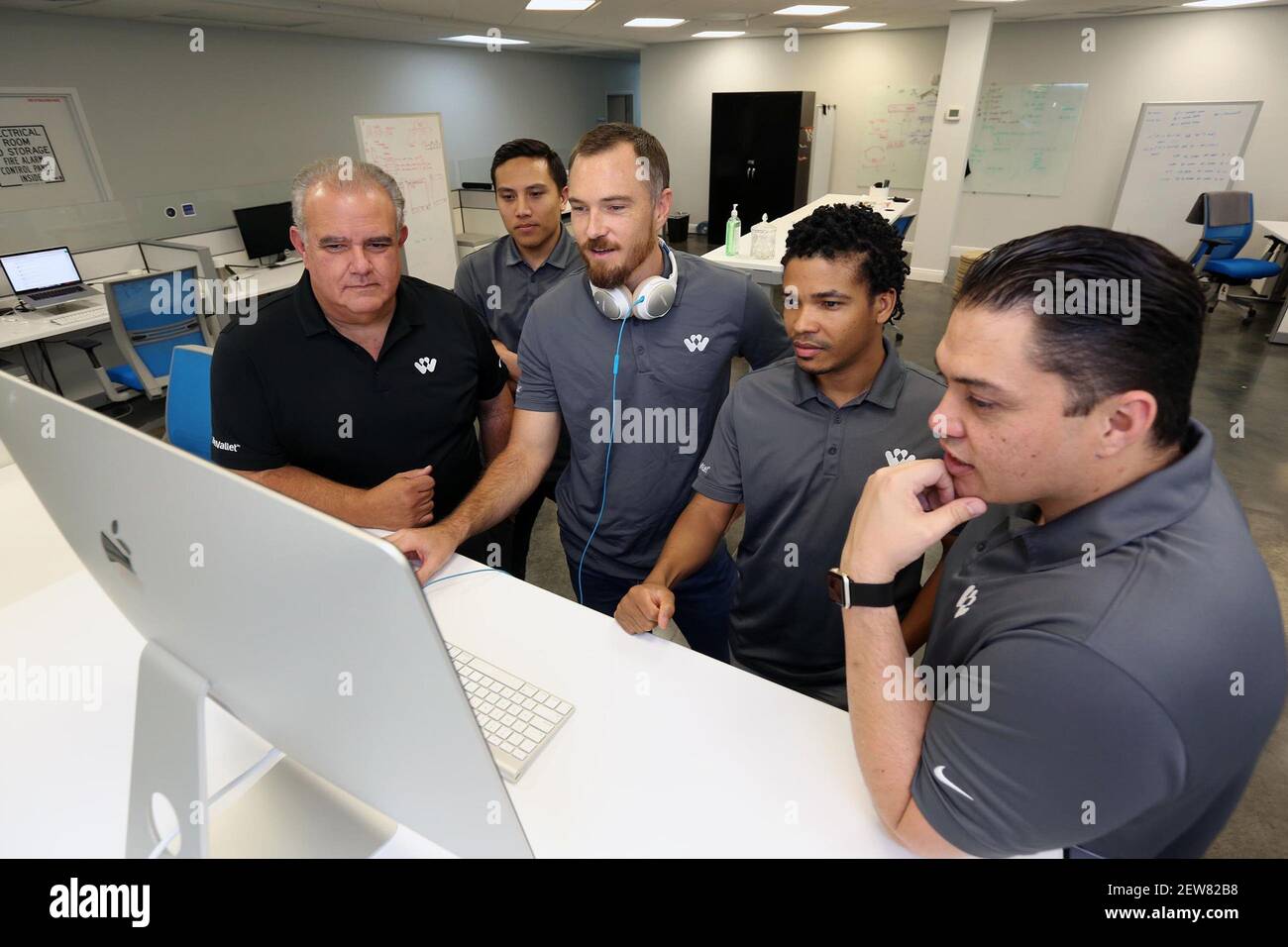 From left, Norberto Menendez, CEO and founder of Life Wallet, Anthony ...