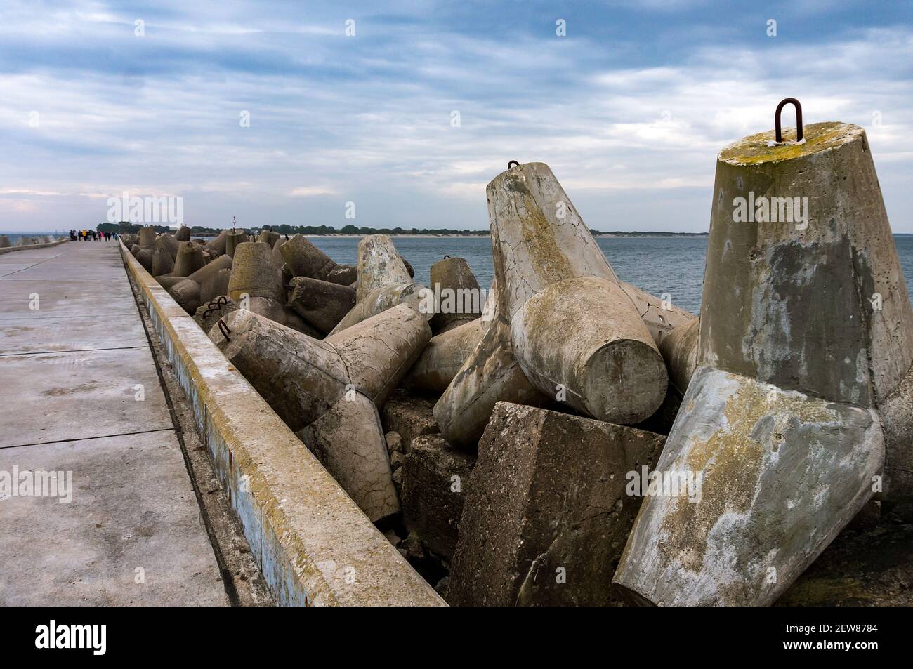 Reinforced concrete structures along the sea pier. Coastal concrete ...