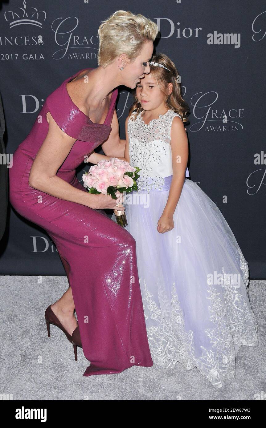 (L-R) Her Serene Highness Princess Charlene of Monaco meets Sloan Levy ...