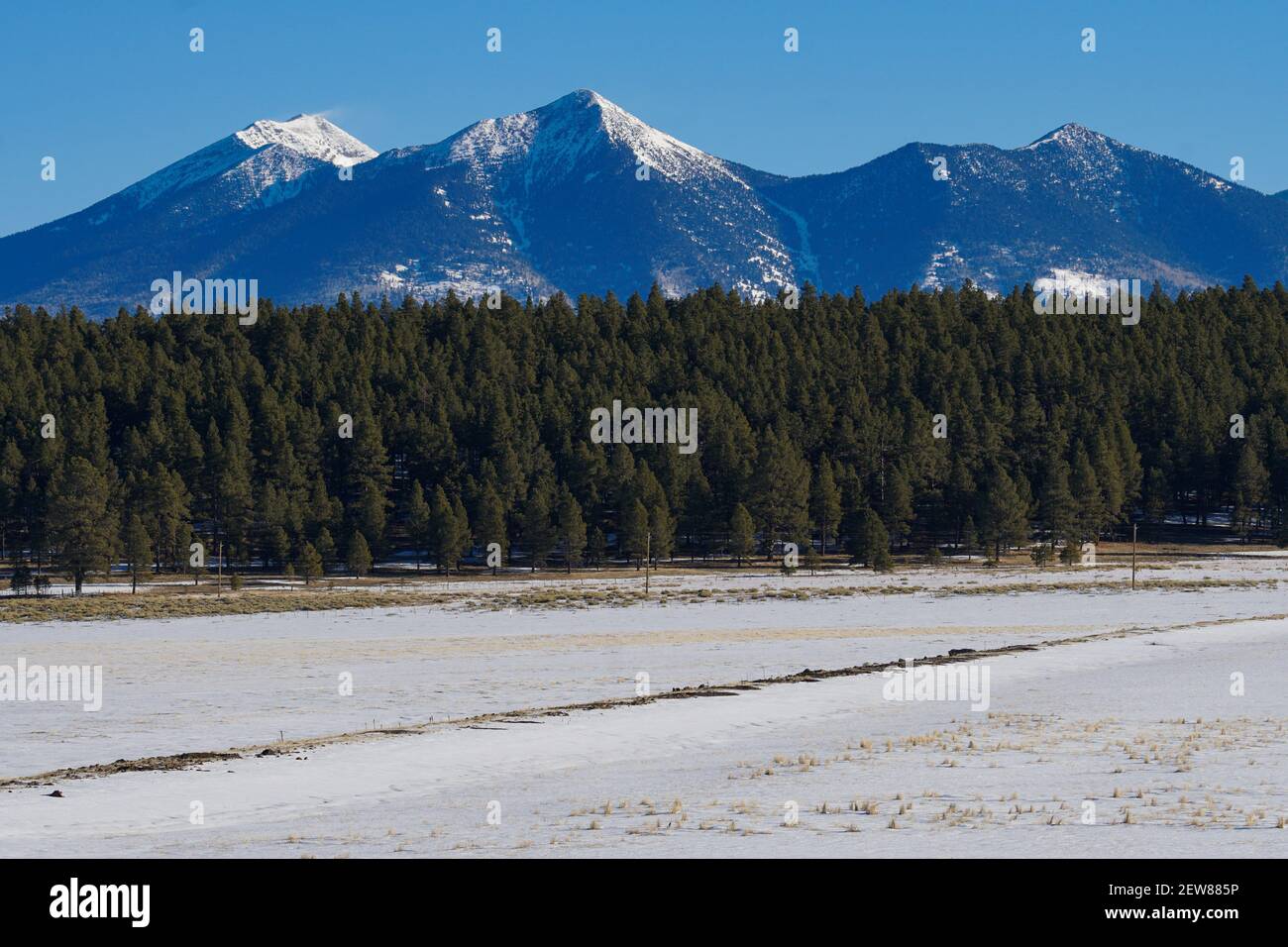 Snow capped San Francisco Peaks and deep snow following a strong winter ...