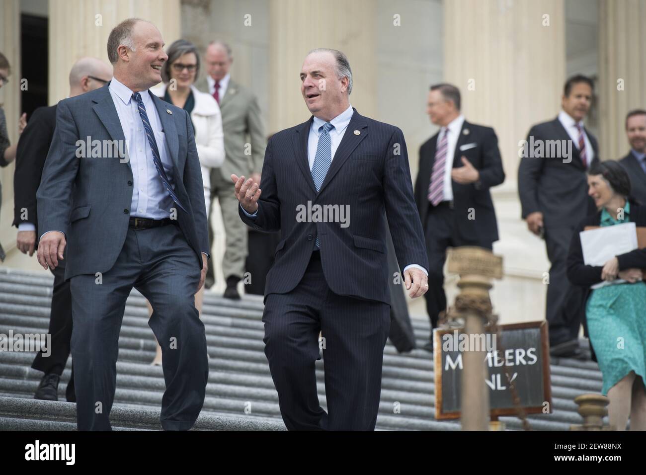UNITED STATES - OCTOBER 26: Reps. Dan Kildee, R-Mich., center, and John ...