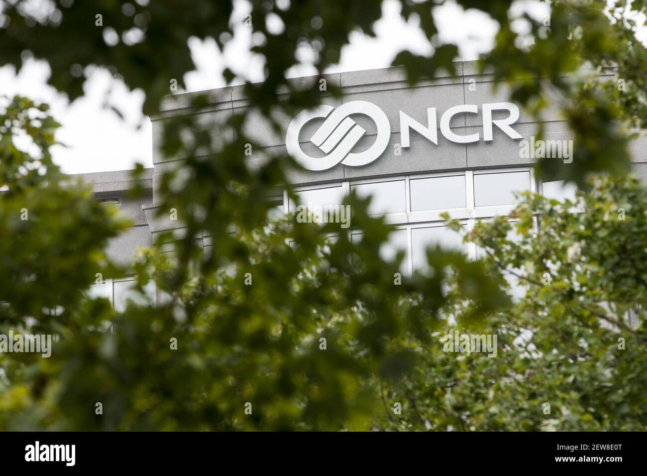 A logo sign outside the headquarters of The NCR Corporation in Duluth ...
