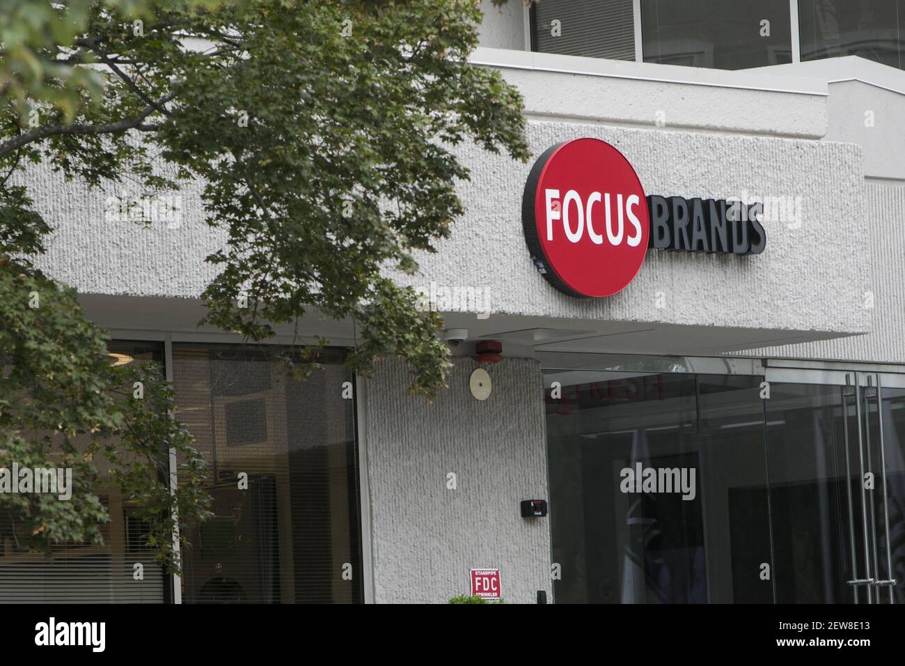 A logo sign outside the headquarters of Focus Brands in Atlanta ...