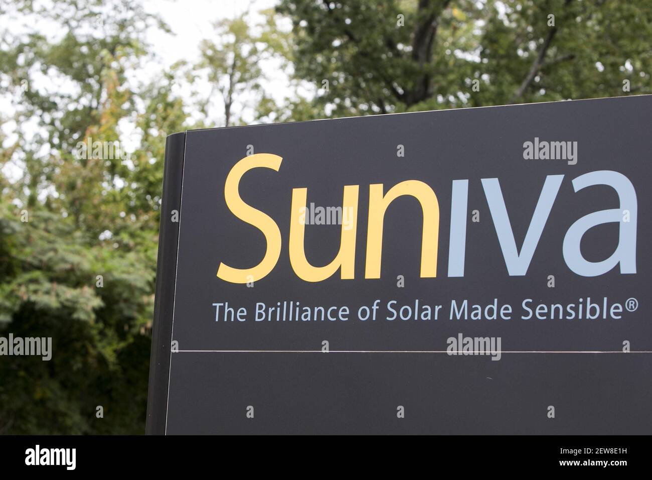 A logo sign outside of the headquarters of Suniva in Norcross, Georgia ...
