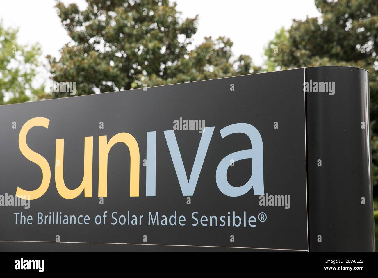 A logo sign outside of the headquarters of Suniva in Norcross, Georgia ...