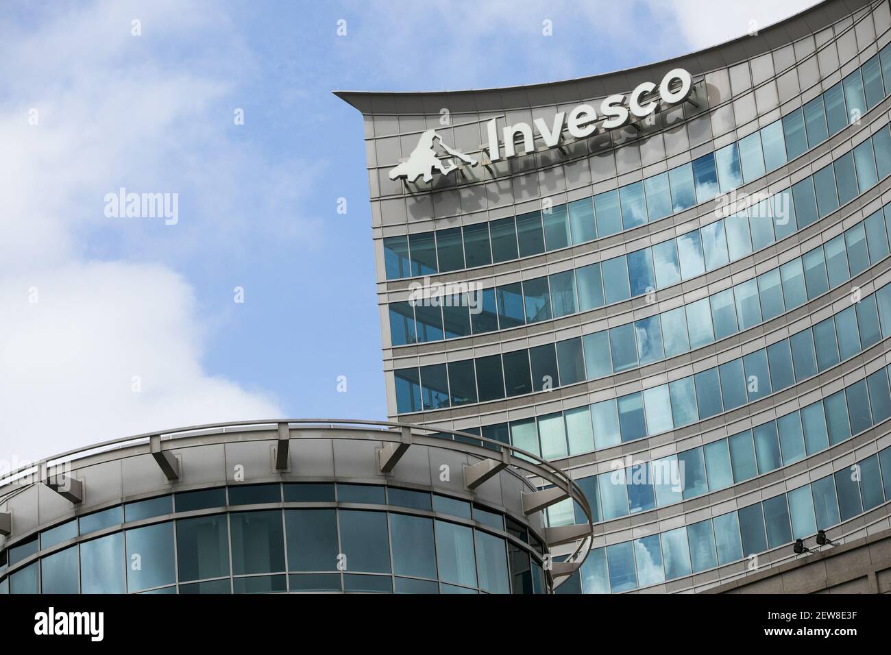A logo sign outside of the headquarters of Invesco Ltd., in Atlanta ...